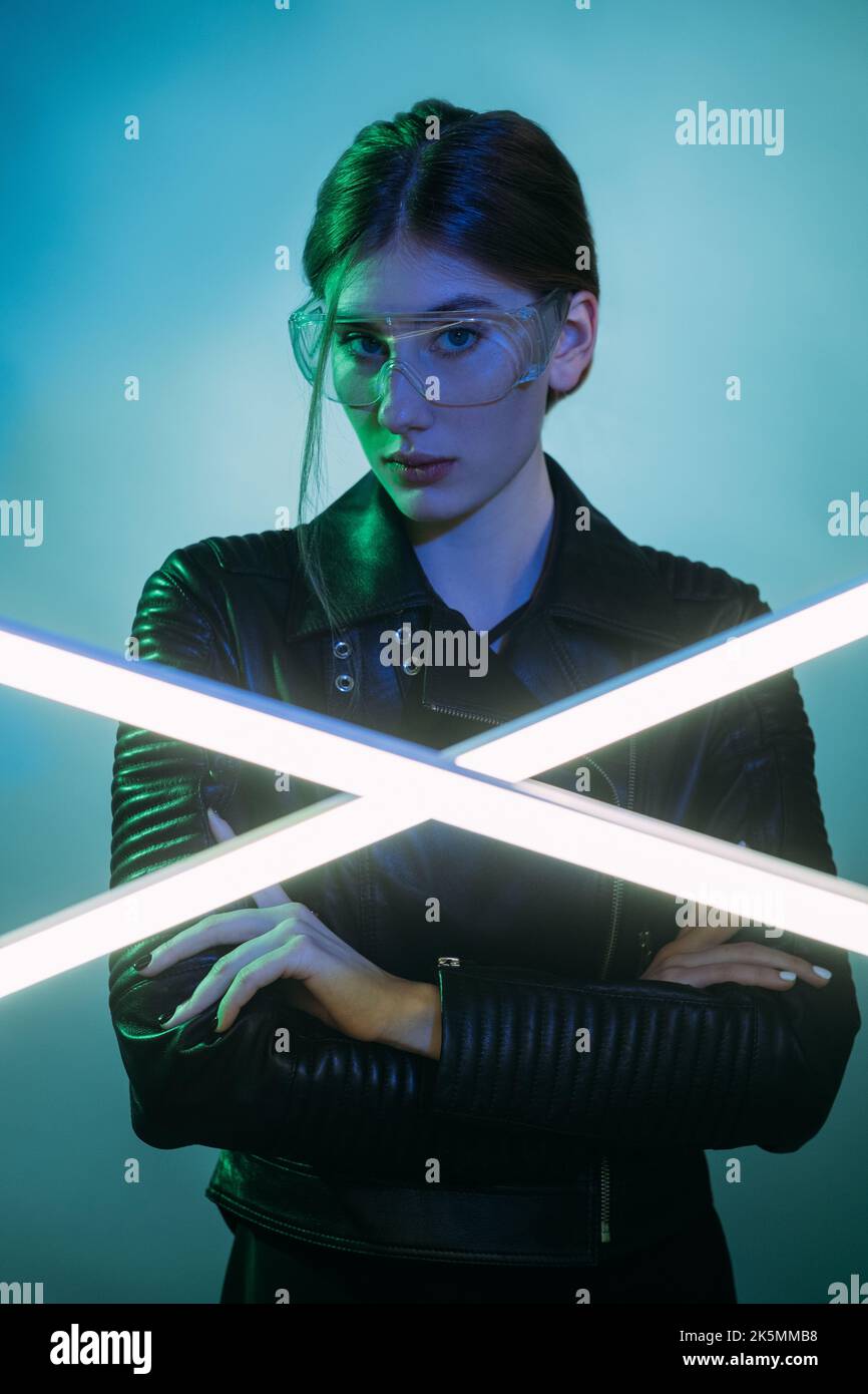 Neon light people. Futuristic portrait. Science fiction. Blue green ...