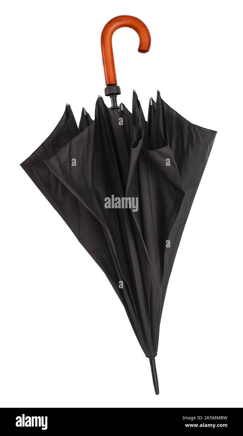 Partially open umbrella on white Stock Photo - Alamy