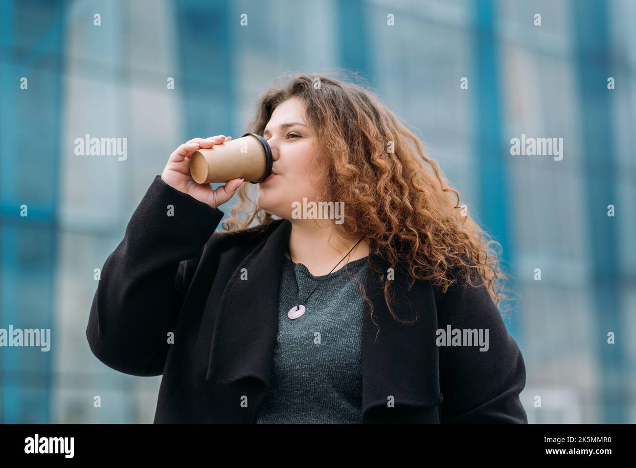 coffee break plus size woman enjoying walk body Stock Photo - Alamy