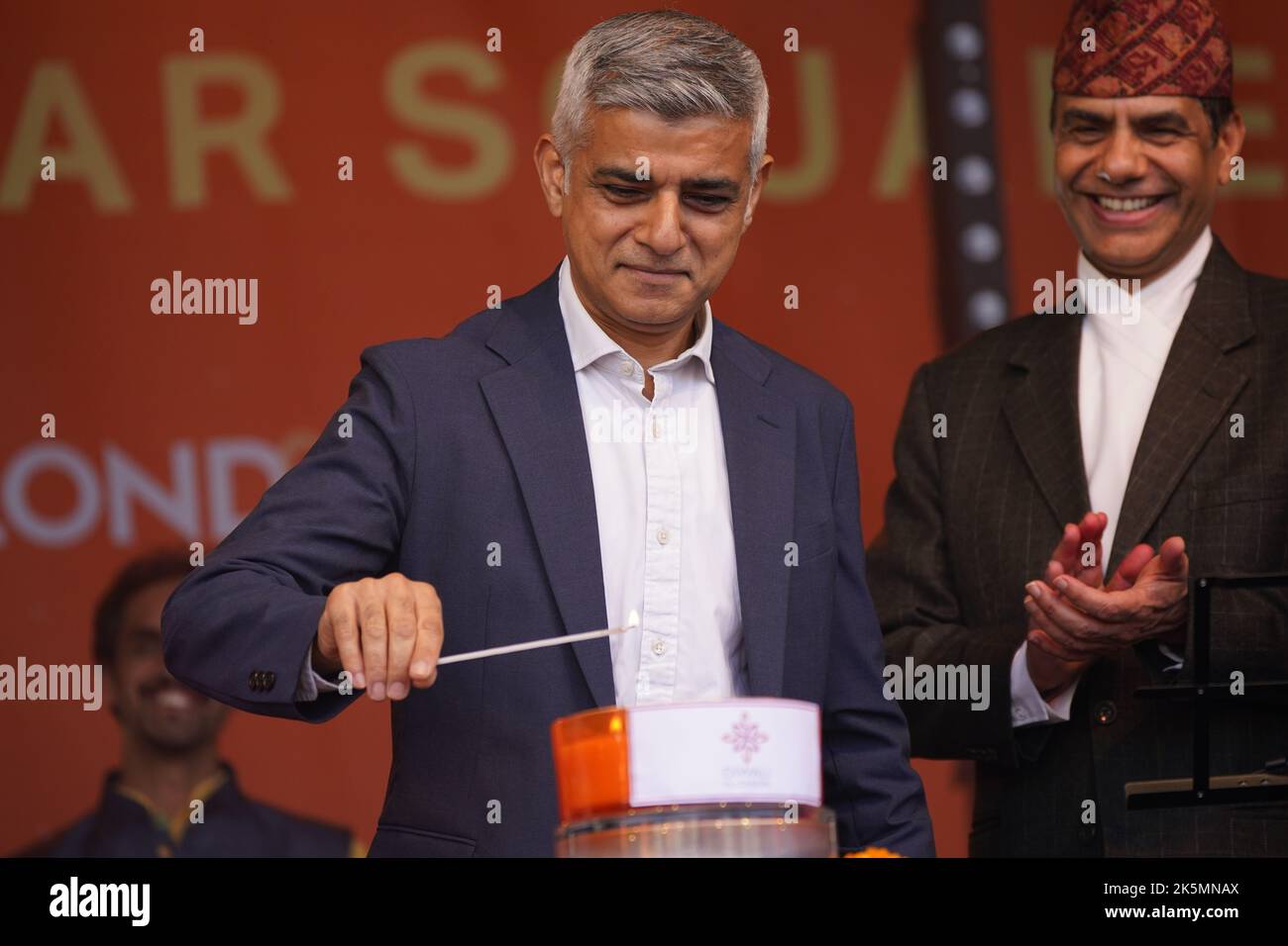 Mayor of London Sadiq Khan lights a candle during the Diwali on the ...