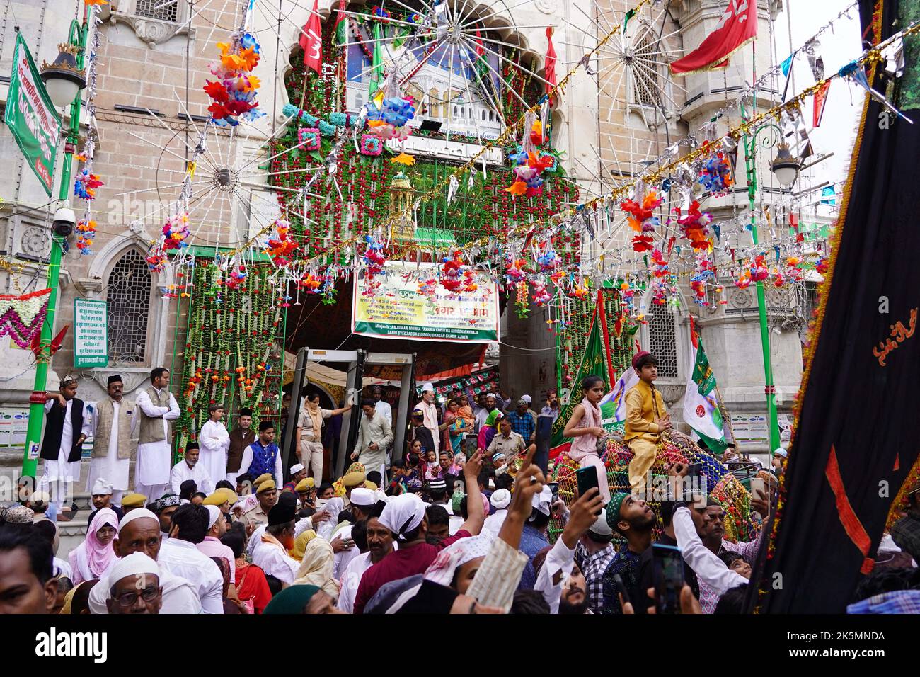 Muslim devotees participate in a procession on the occasion of Eid-e ...