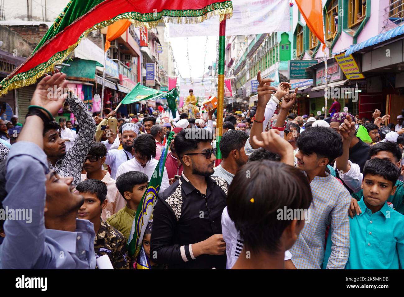 Muslim devotees participate in a procession on the occasion of Eid-e ...