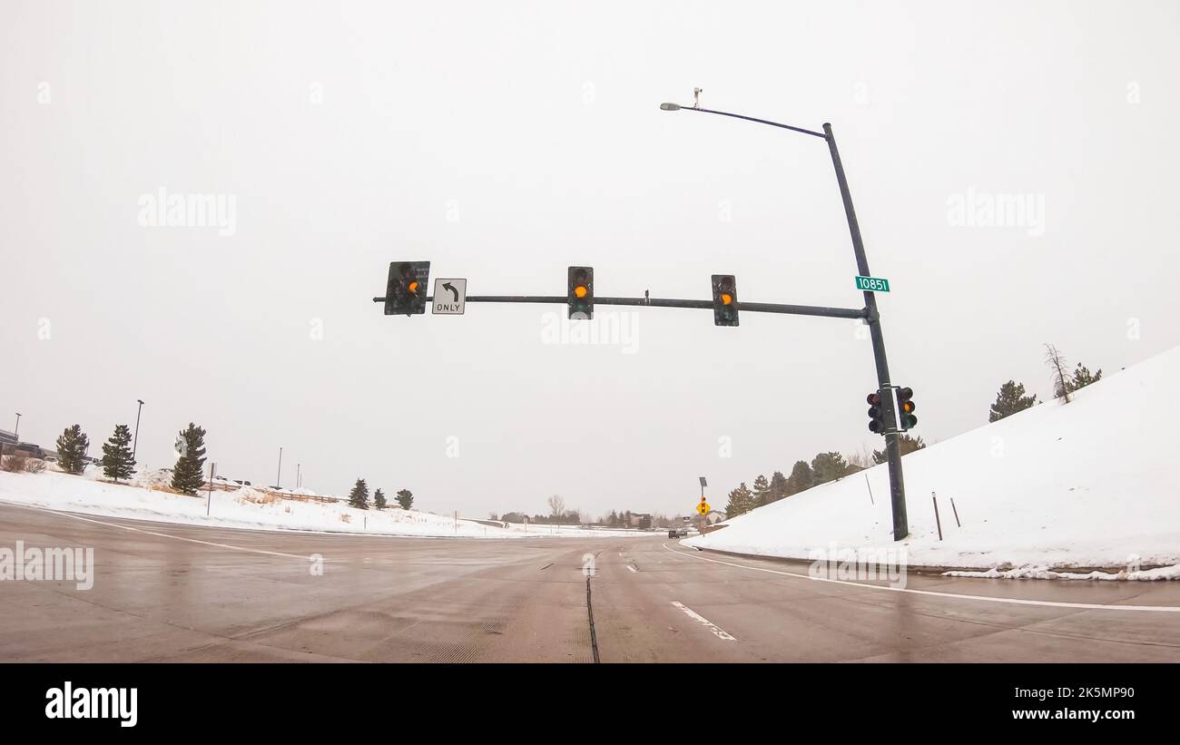 Driving in suburban area Stock Photo - Alamy