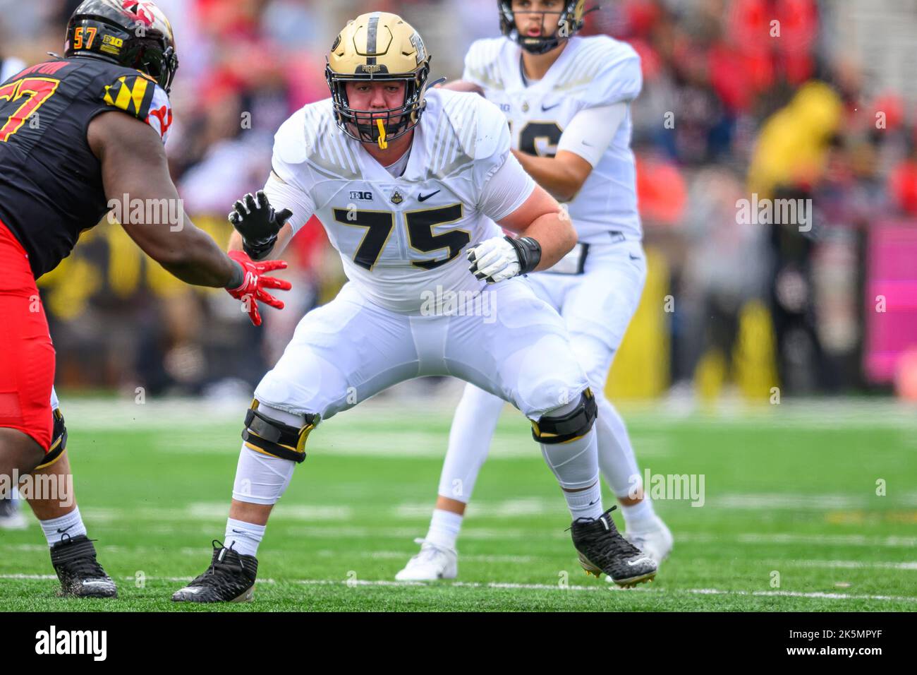 October 08, 2022: Purdue Boilermakers offensive lineman Spencer Holstege (75) pass blocks during ...