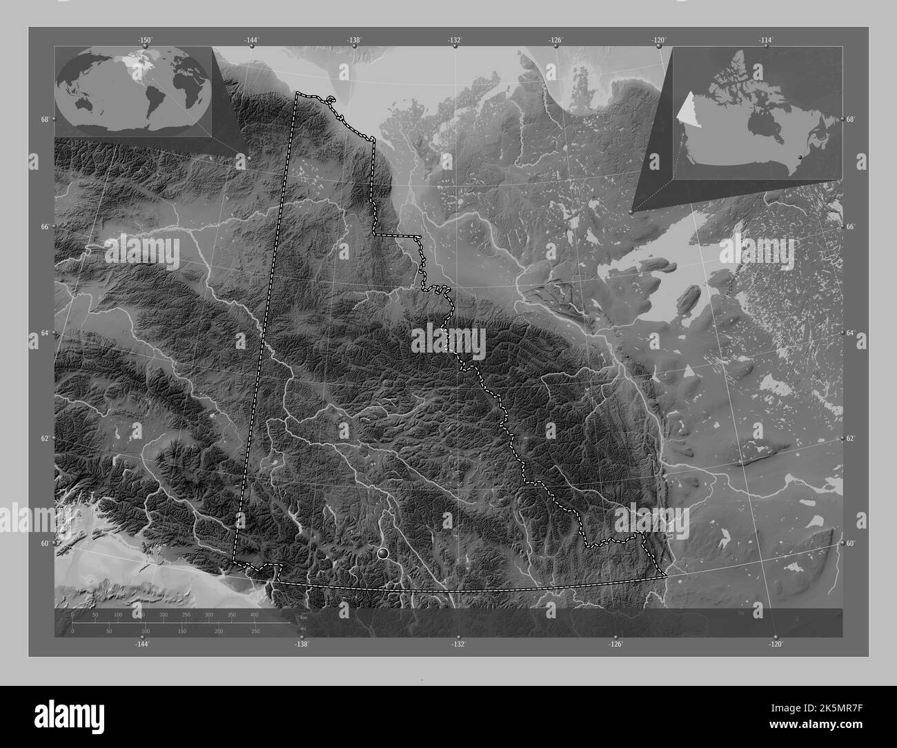 Yukon, territory of Canada. Grayscale elevation map with lakes and rivers. Corner auxiliary ...