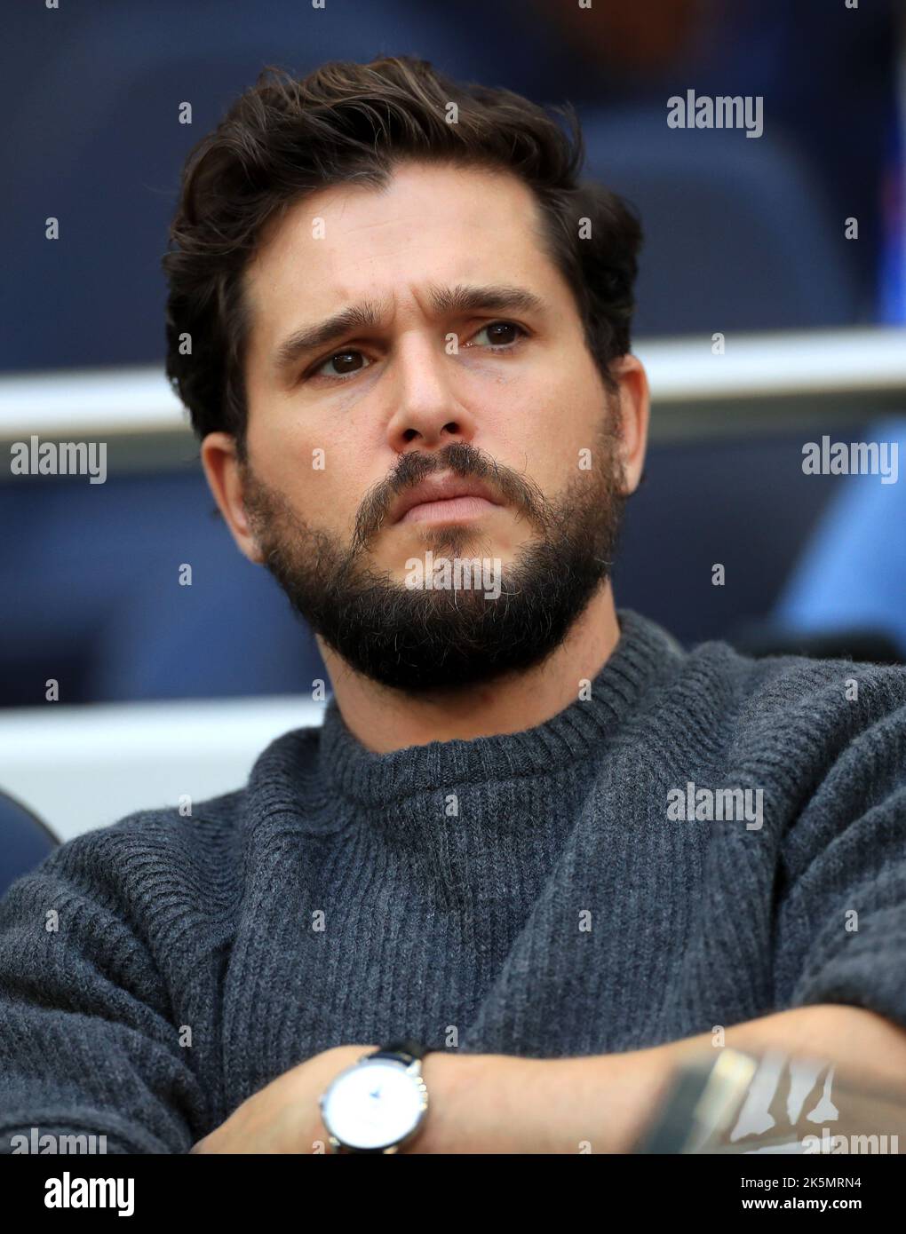 Actor Kit Harrington watches the action during the NFL International ...