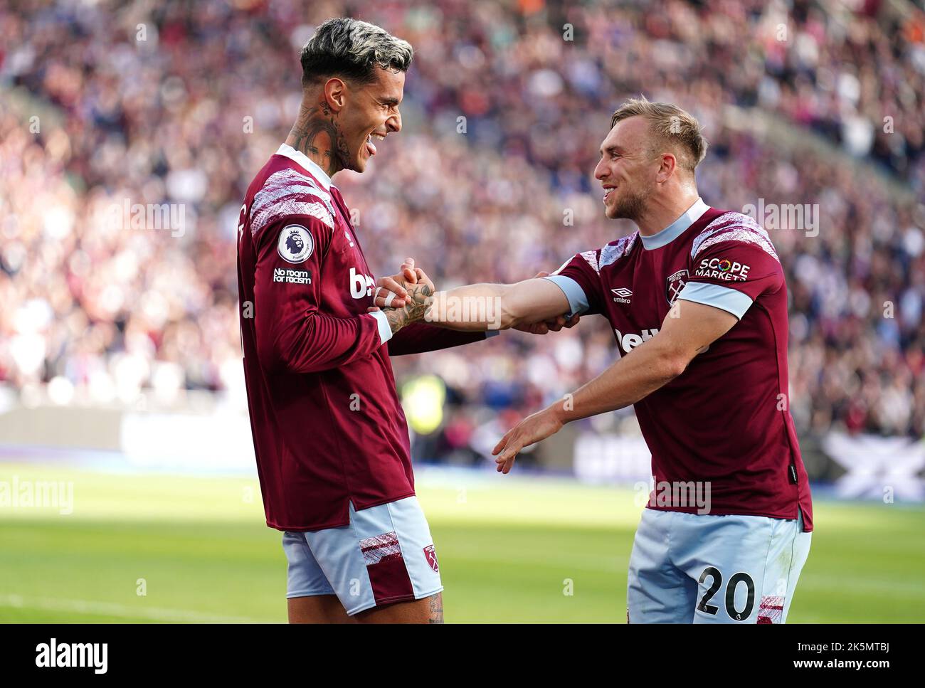 West Ham United's Gianluca Scamacca (left) celebrates scoring their ...