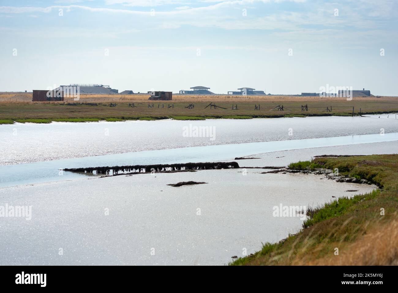 Atomic munitions testing laboratories in the distance across a flat ...