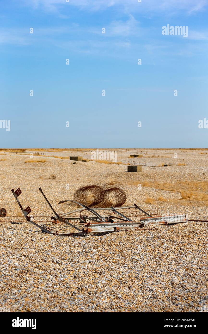 Flat shingle landscape with metal debris in foreground, Orford Ness ...