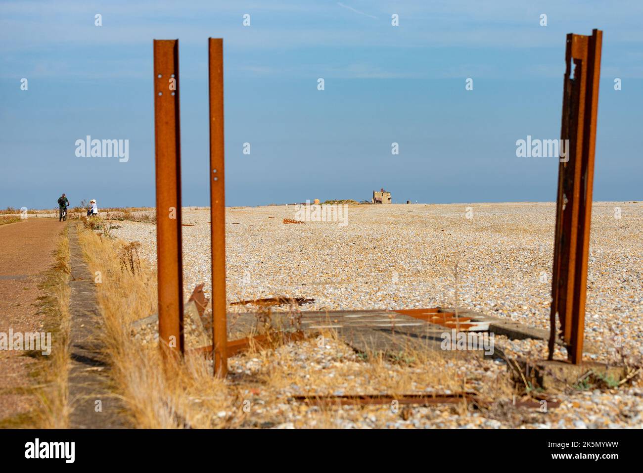 Rusted remnants of metal supports in a shingle landscape with abandoned ...
