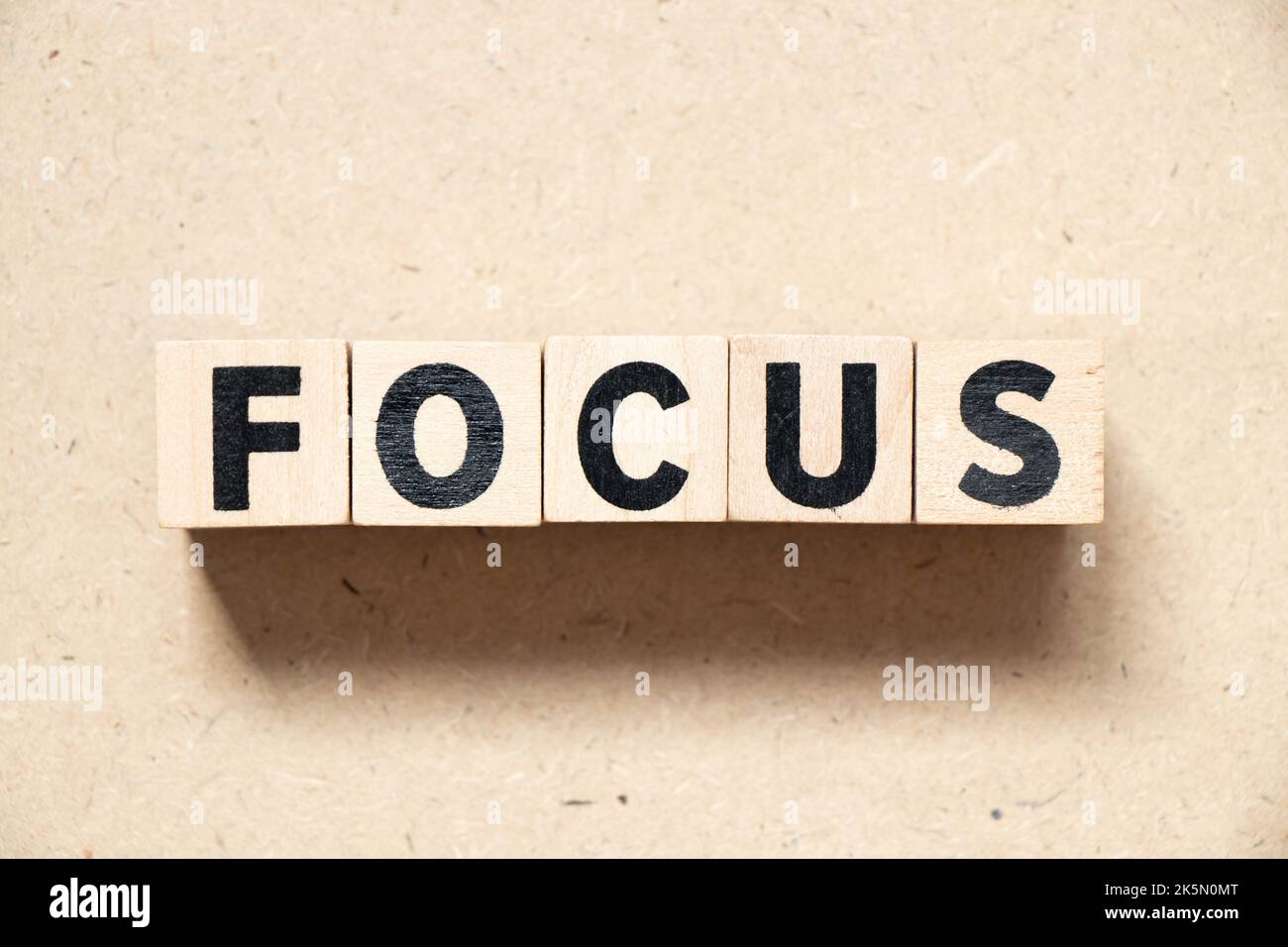 Alphabet letter block in word focus on wood background Stock Photo - Alamy