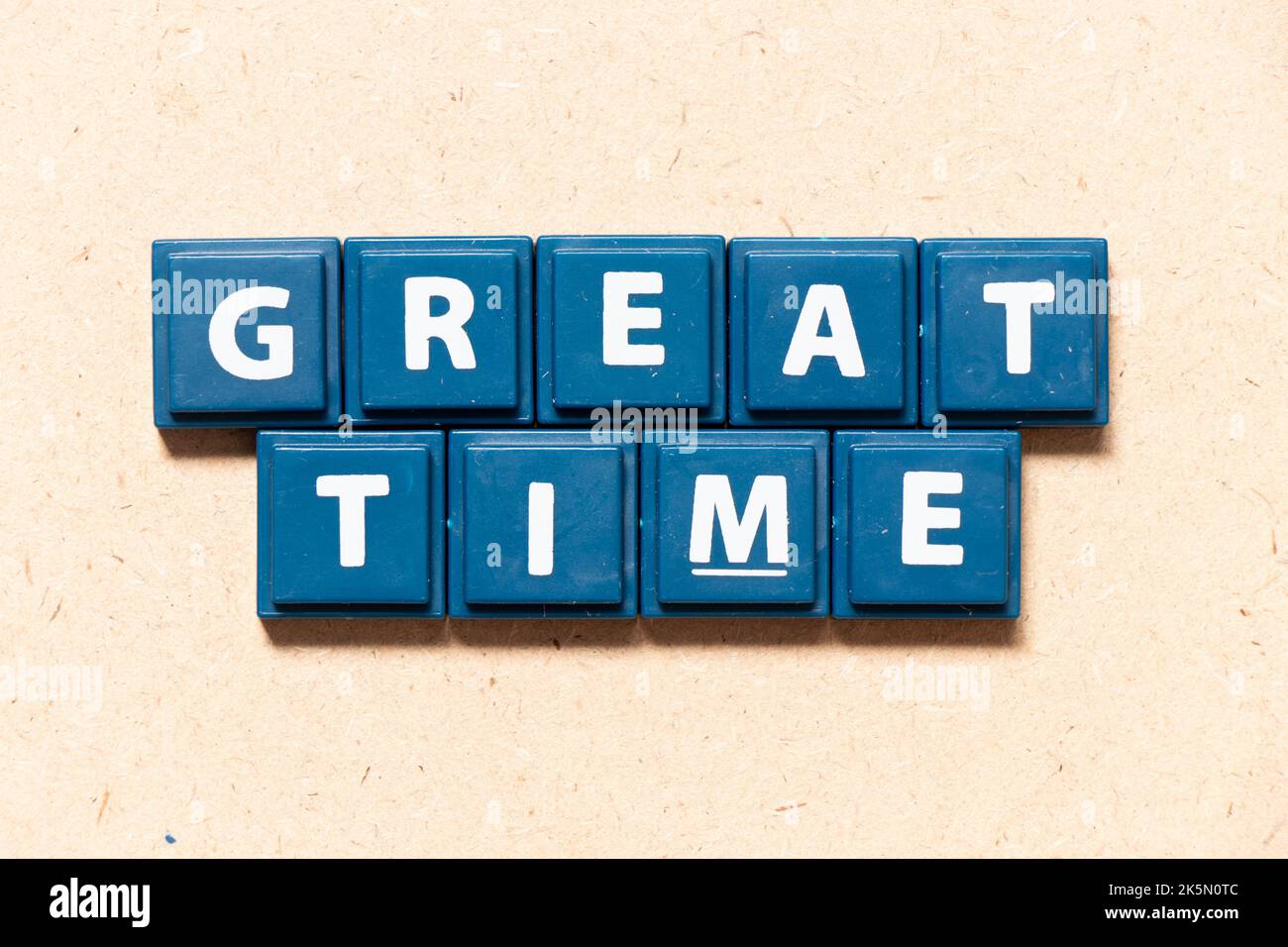 Tile letter in english word great time on wood background Stock Photo ...