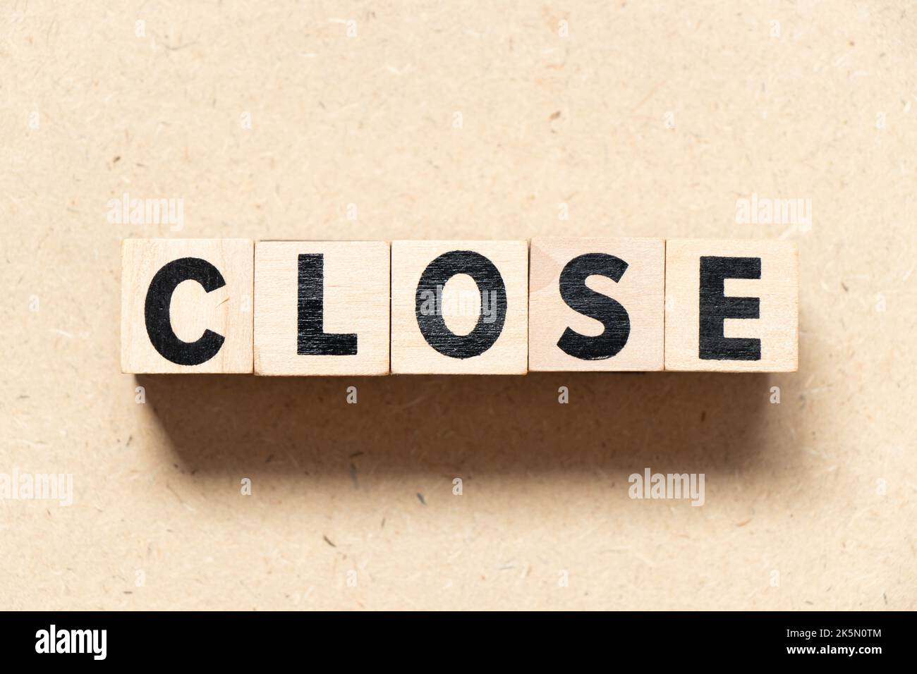 Alphabet letter block in word close on wood background Stock Photo - Alamy