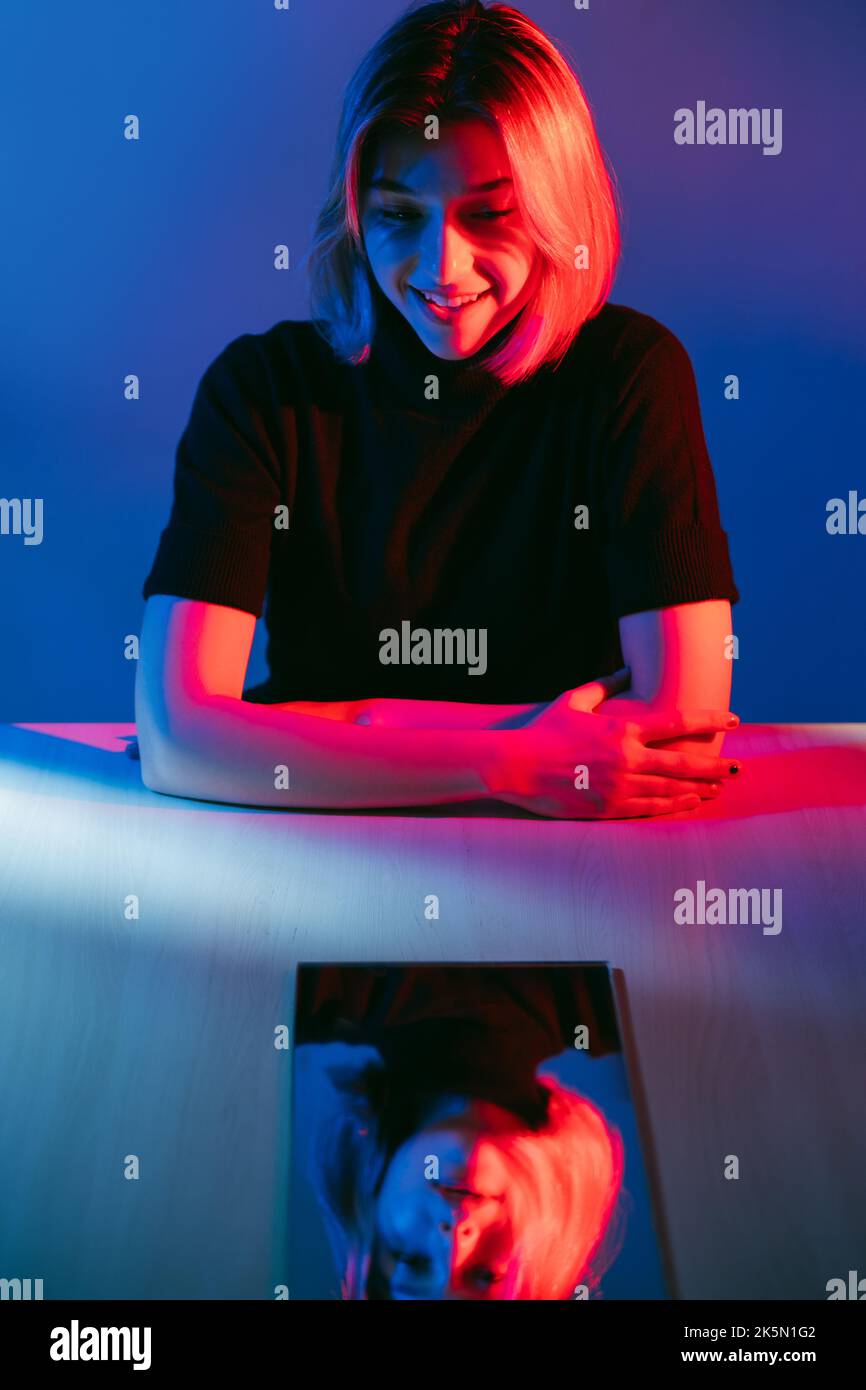 Emotional crisis. Color light portrait. Dual personality. Enthusiastic ...