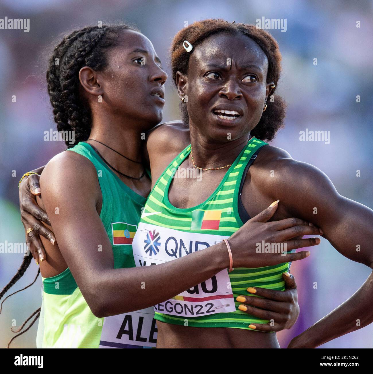Habitam Alemu of Ethiopia and Noélie Yarigo of Benin competing in the ...