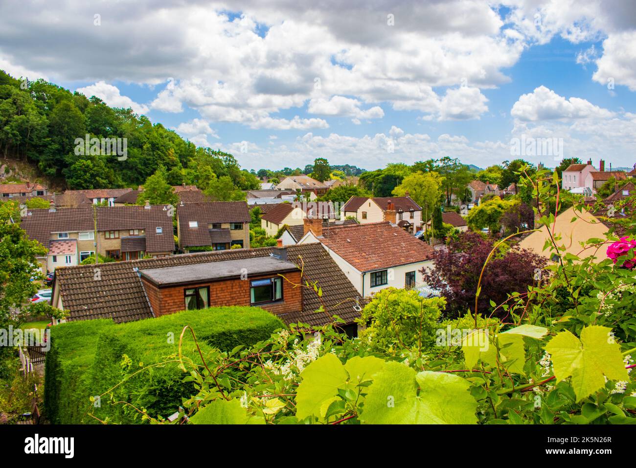 Street view with Pretty old houses of Cheddar -a large village and ...