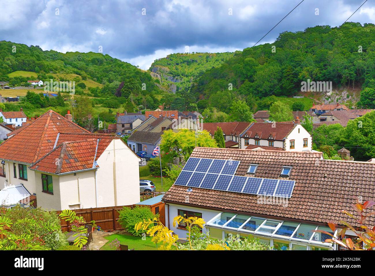 Street view with Pretty old houses of Cheddar -a large village and ...