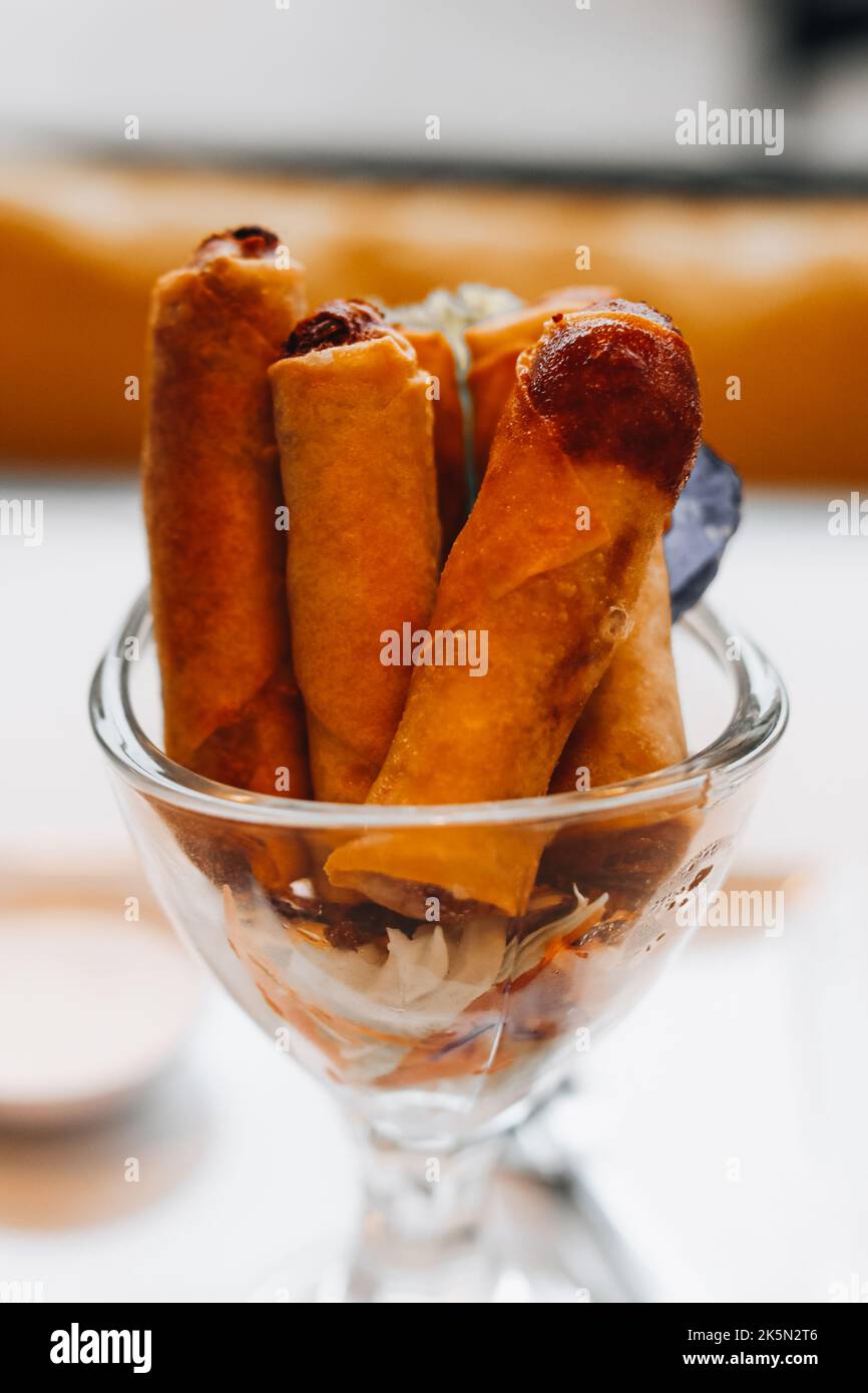 Deep fried spring rolls. Traditional Thai cuisine. Vertical Stock Photo ...