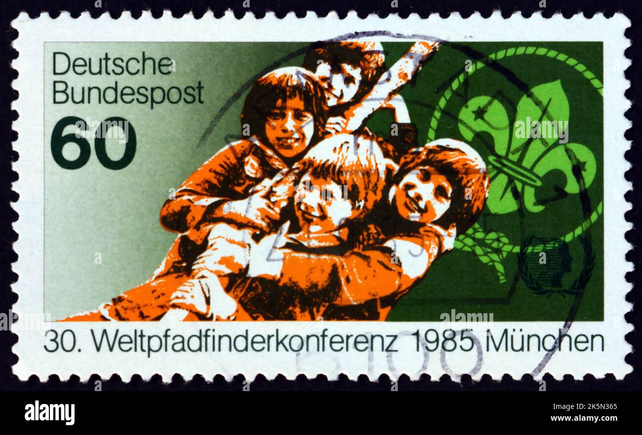 GERMANY - CIRCA 1985: a stamp printed in Germany shows scouts, scouting ...