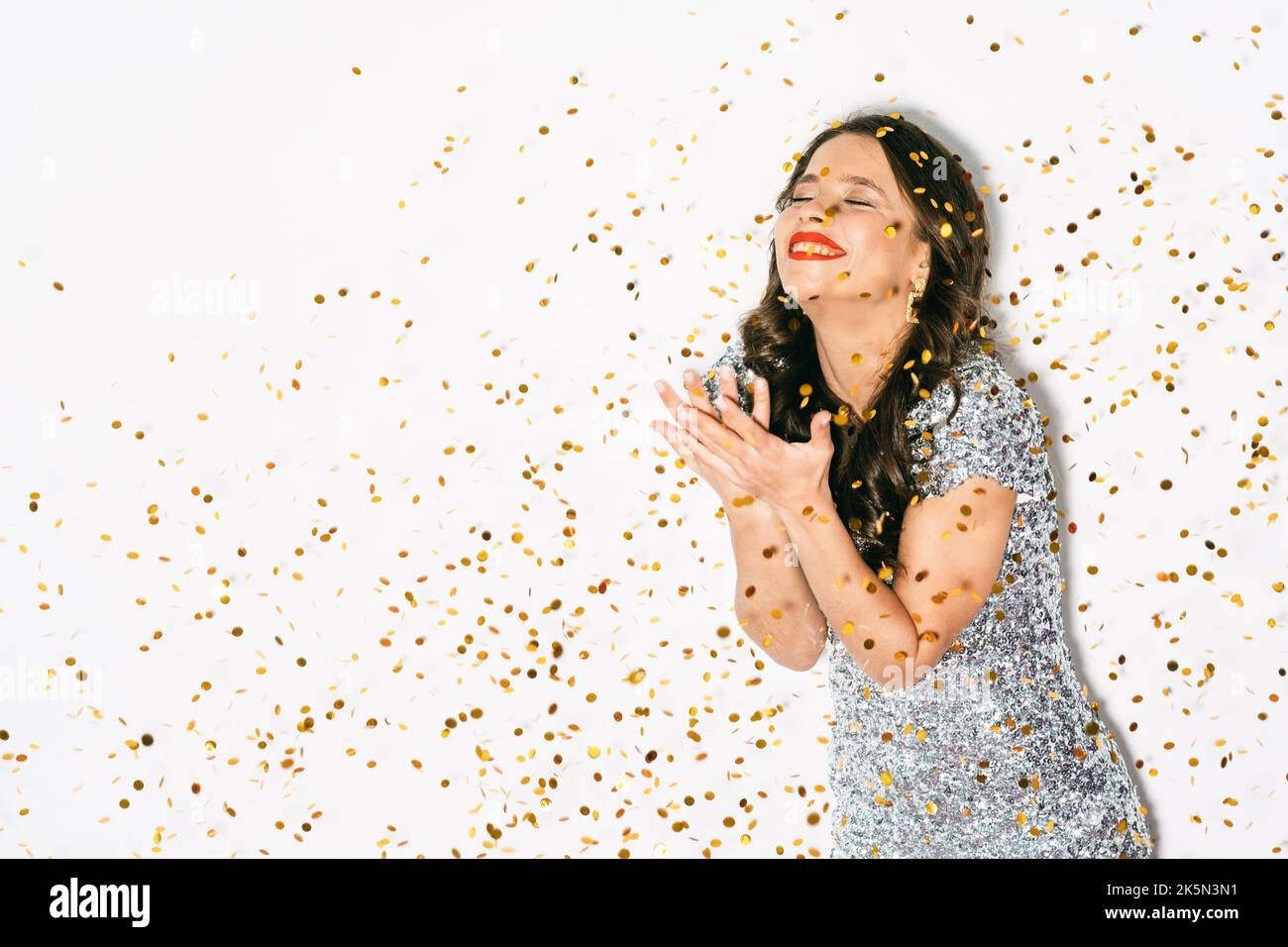 holiday celebration excited woman festive decor Stock Photo - Alamy