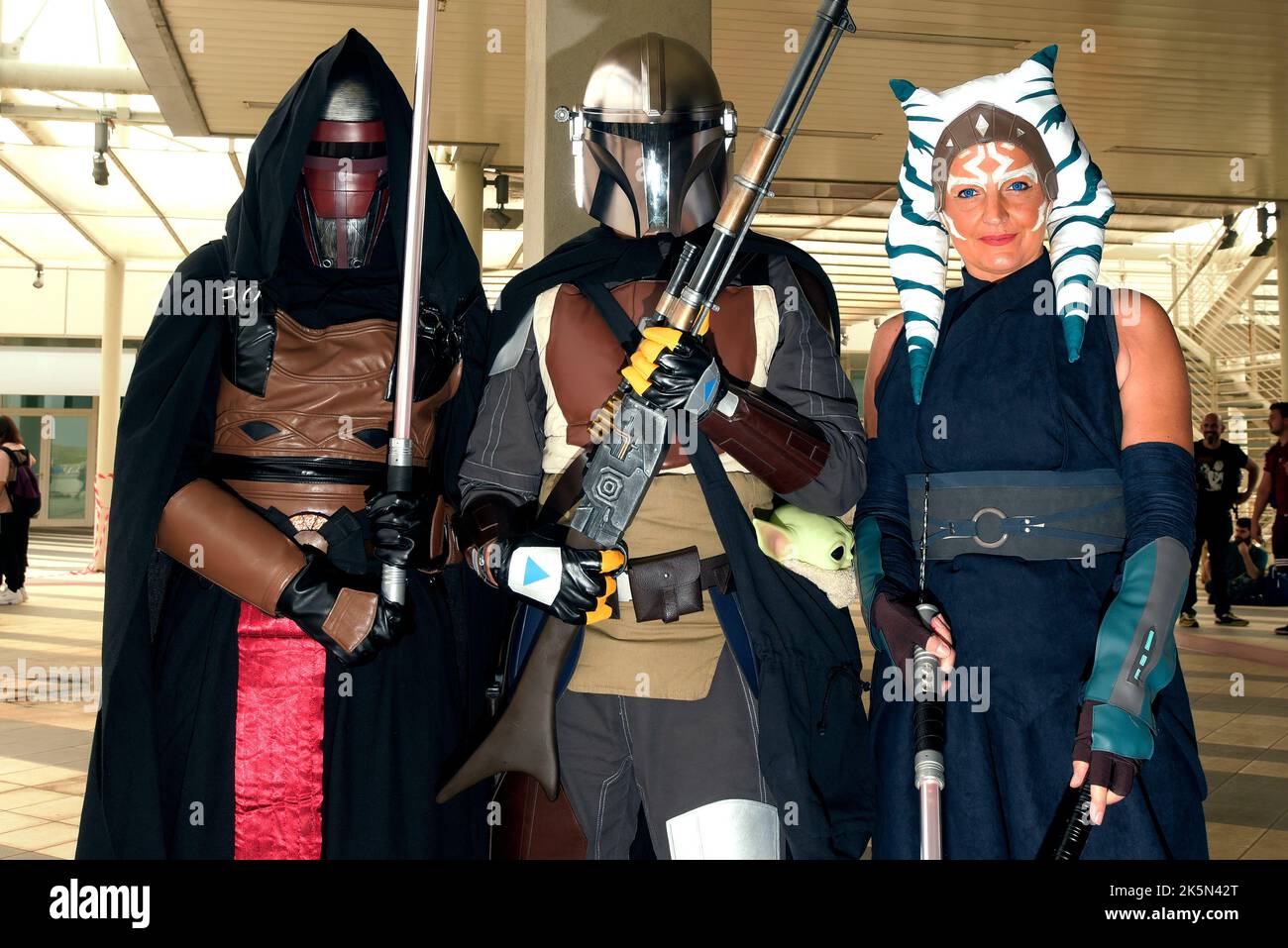 Cosplayers pose for a photo during the 29th edition of Romics, an ...