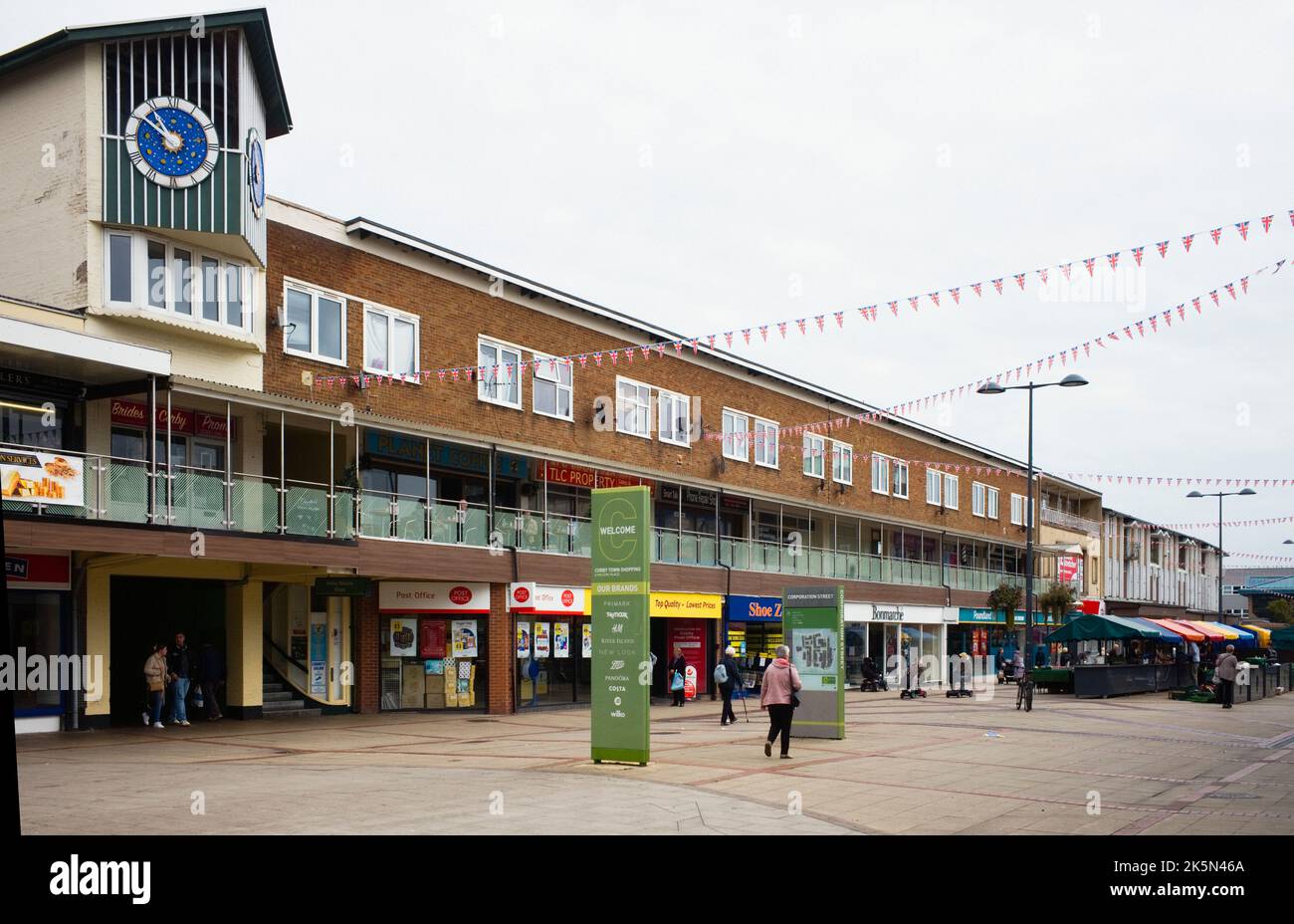 The 1960s style centre of Corby town looking down Corporation Street ...