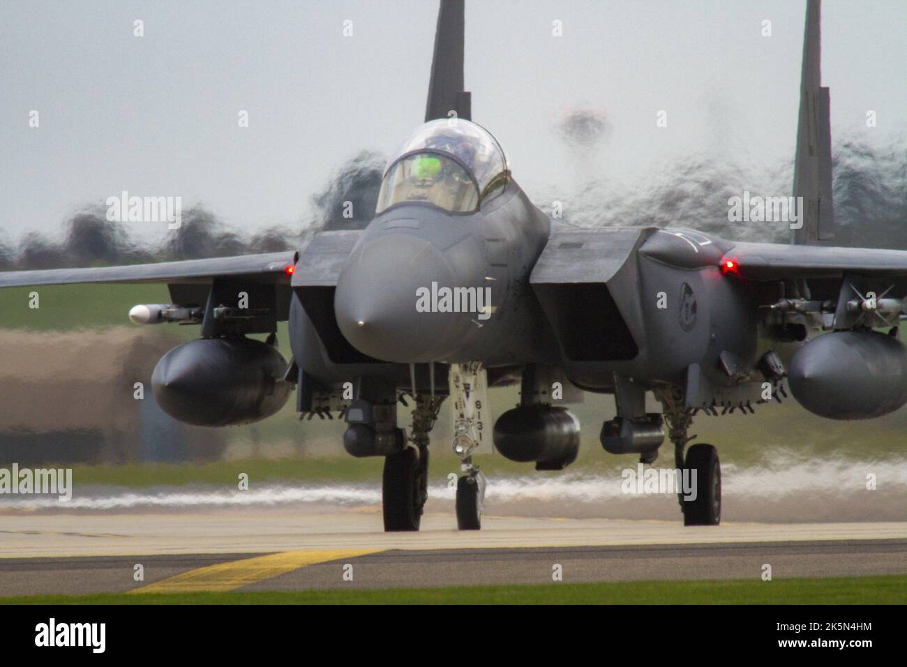 An USAF F-15E fighter jet taking off from RAF Lakenheath in Suffolk ...