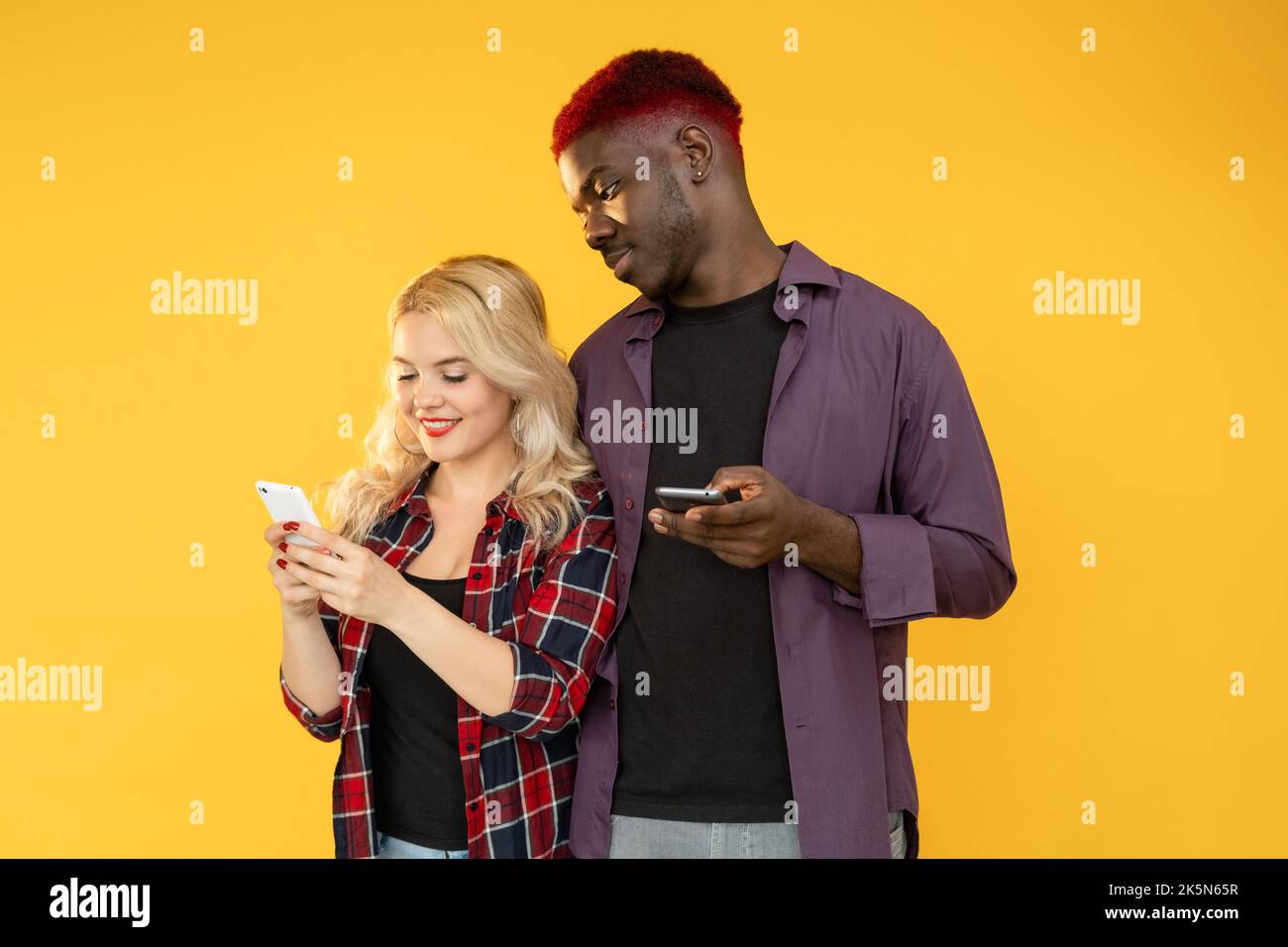 Happy multiracial couple browsing hi-res stock photography and images ...