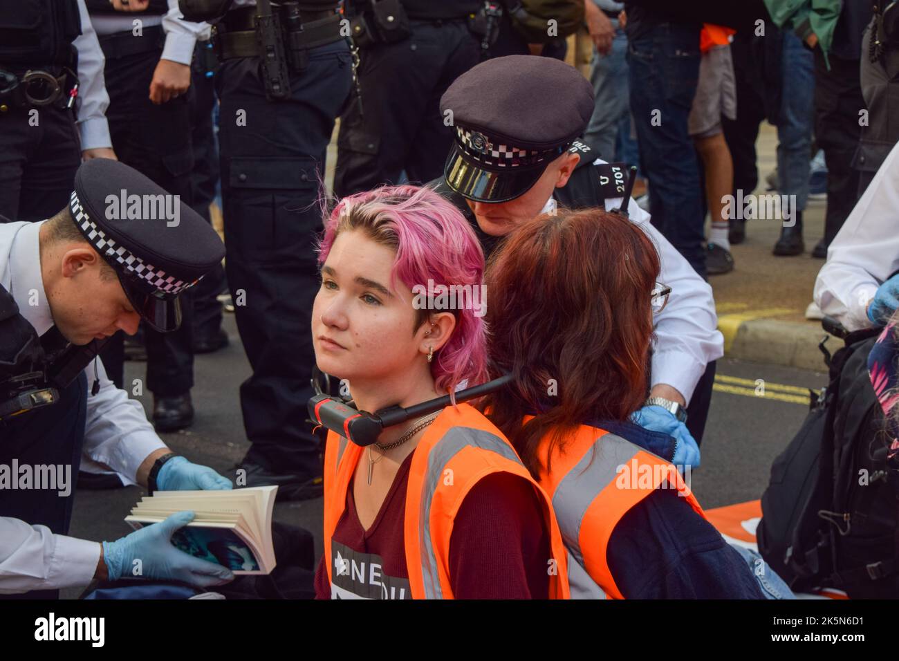 London, UK. 9th October 2022. Just Stop Oil activist Phoebe Plummer and ...