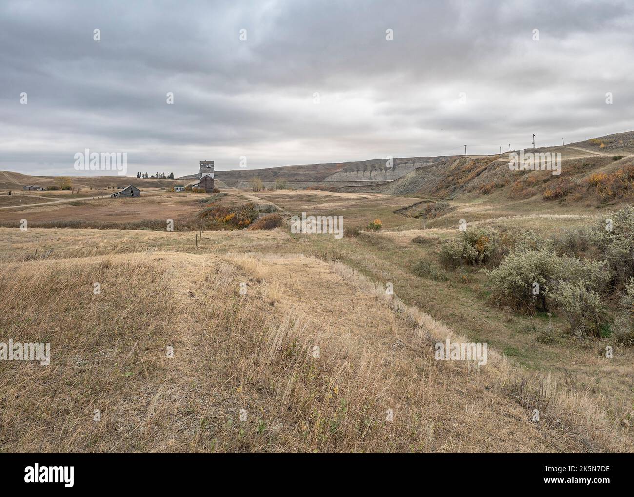 Abandoned buildings and railroad in the ghost town of Sharples, Alberta ...