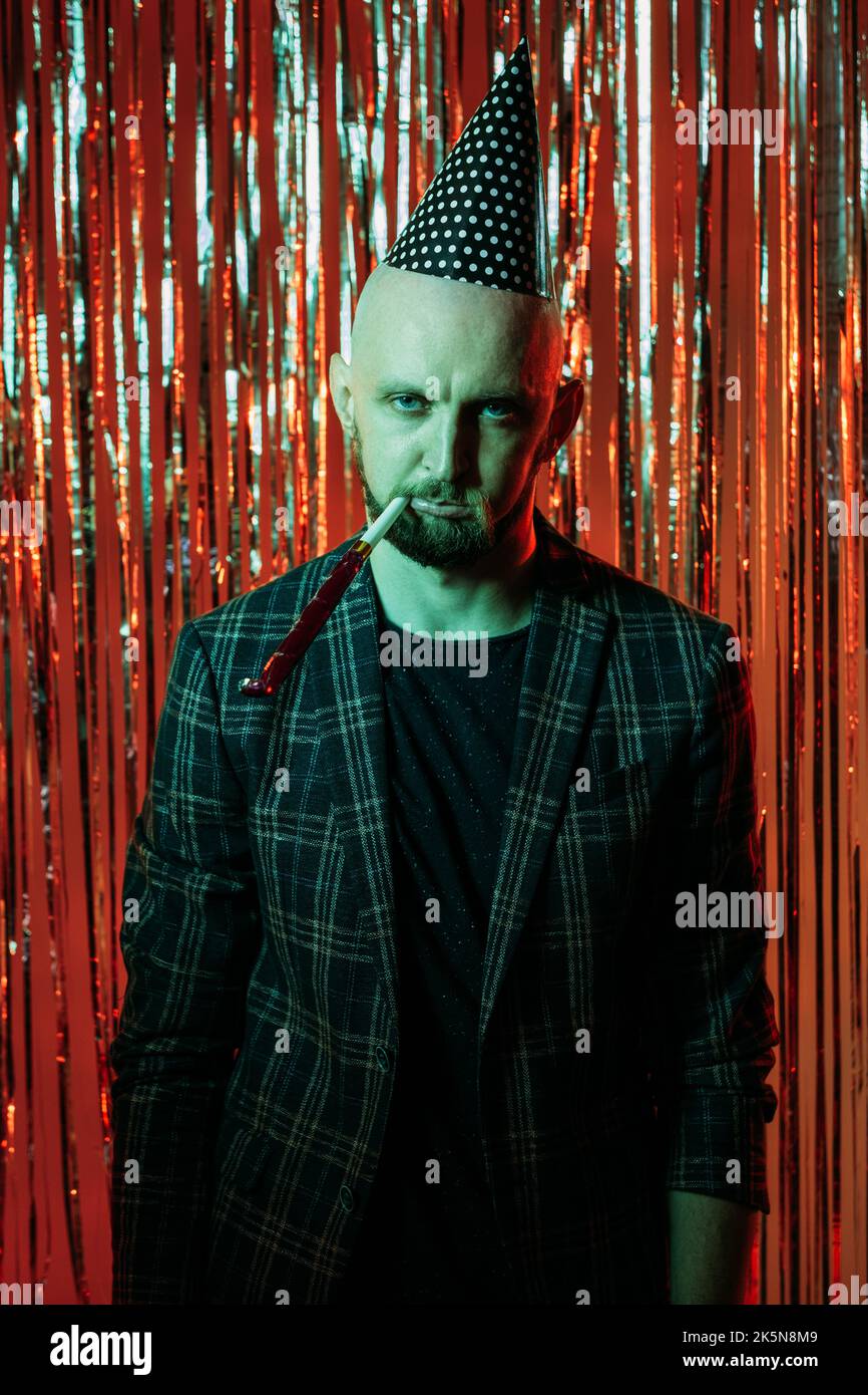 birthday look bored man silly holiday party fun Stock Photo - Alamy