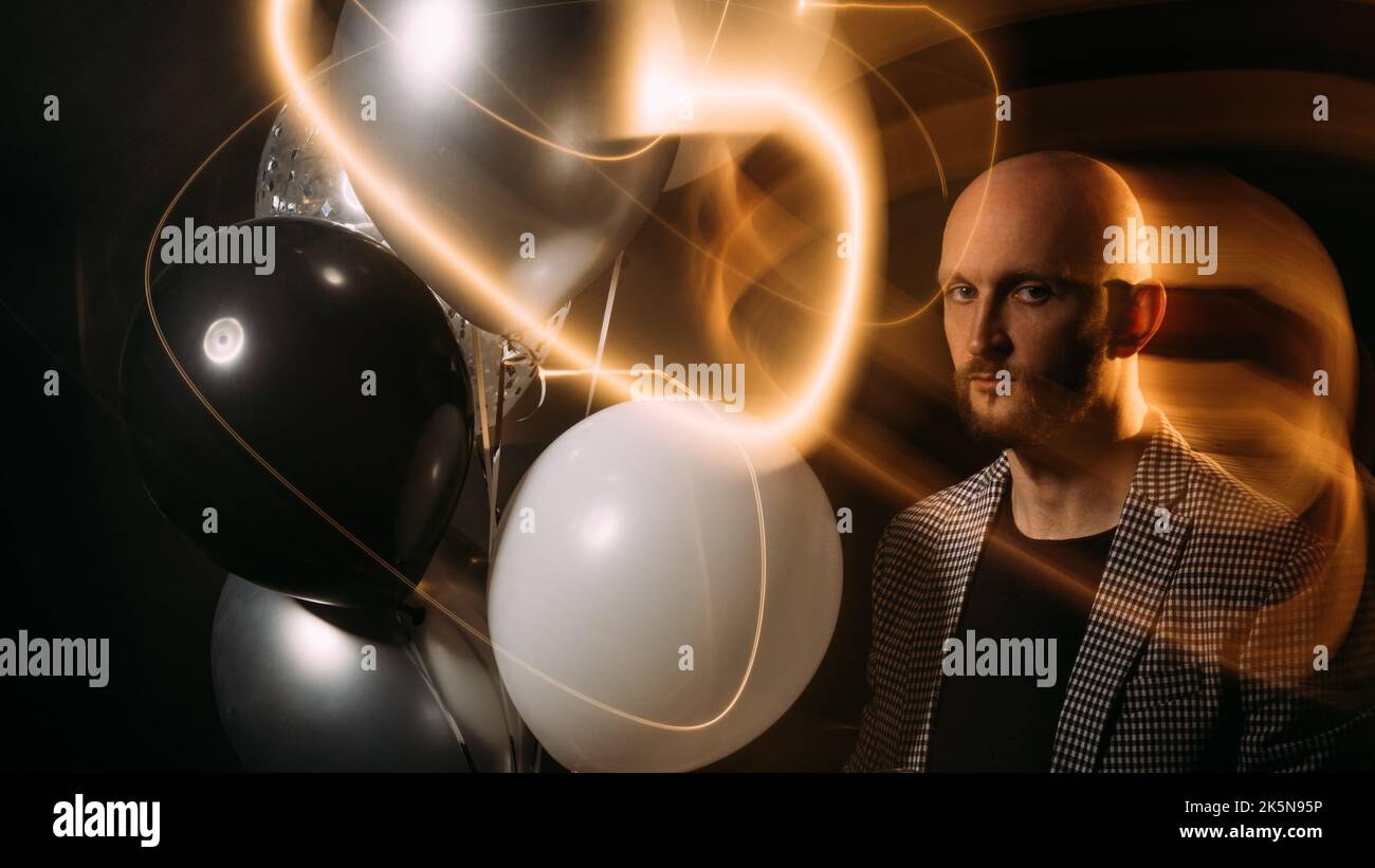 birthday party serious man bad holiday festive Stock Photo - Alamy