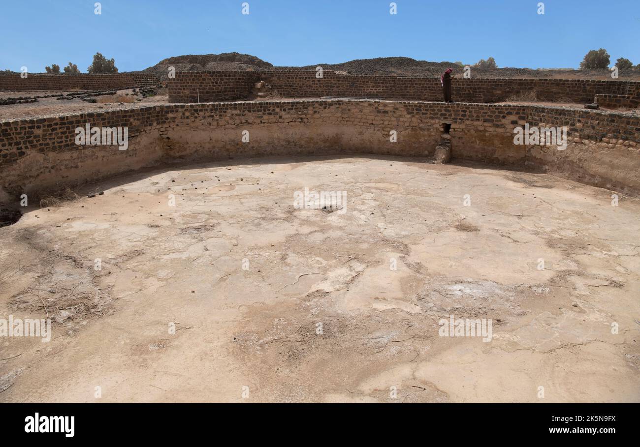 Dried cistern or reservoir part of remains the ancient fort of Fayd ...