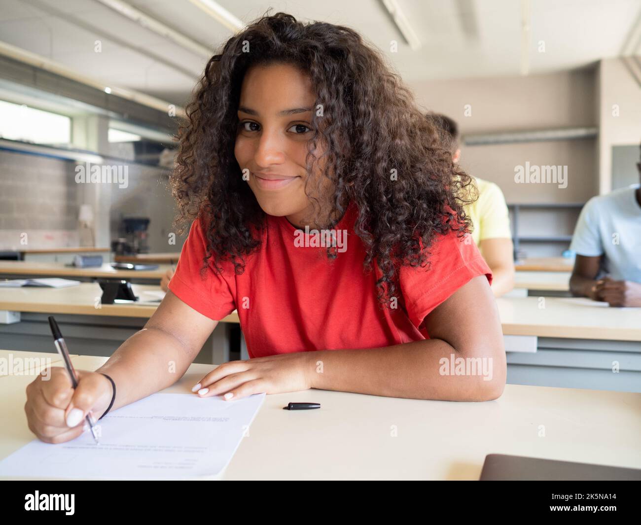 Student taking test desk hi-res stock photography and images - Alamy