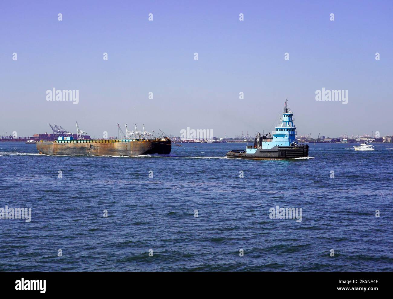 New York, USA. 10/0702022 New York City, NY Tug boat and barge on the ...
