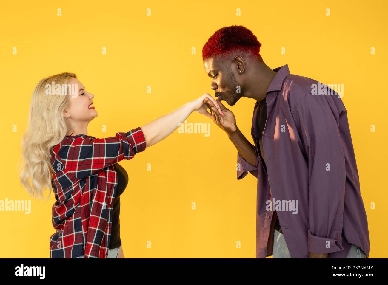 Hand kiss. True gentleman. Multiracial relationship. Romantic date. in ...