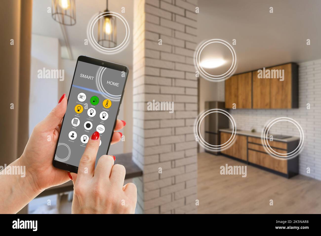 Smart home technology interface on smartphone app screen with augmented ...
