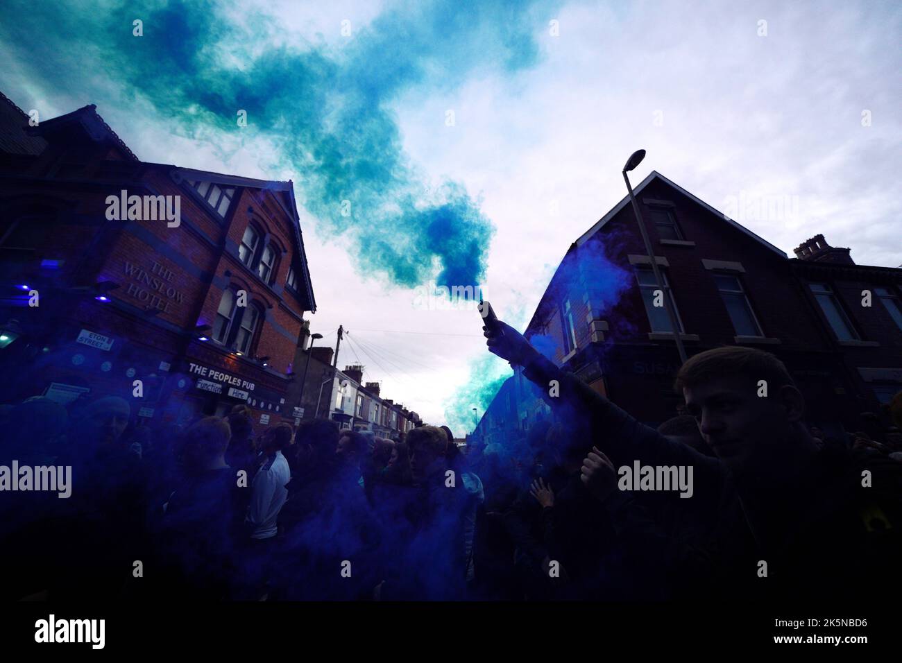 Everton fans with flares outside the ground ahead of the Premier League ...