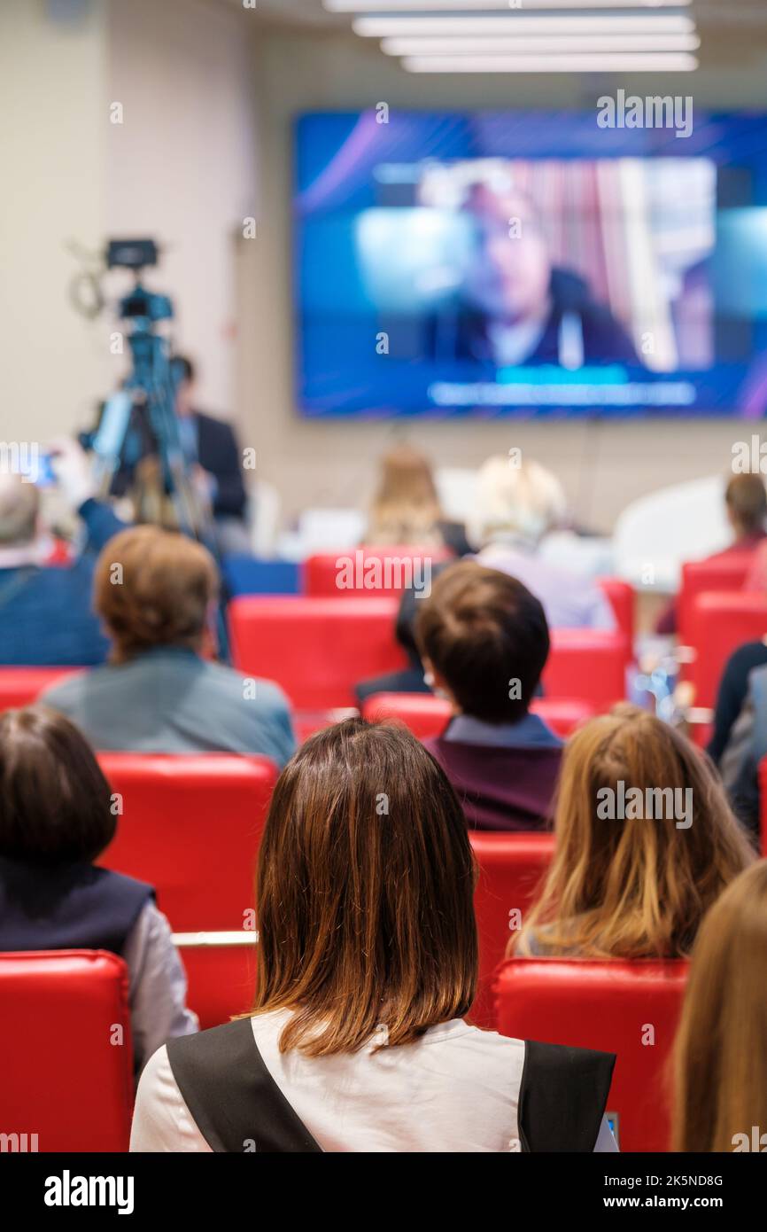 Online conference in narrow room Stock Photo - Alamy