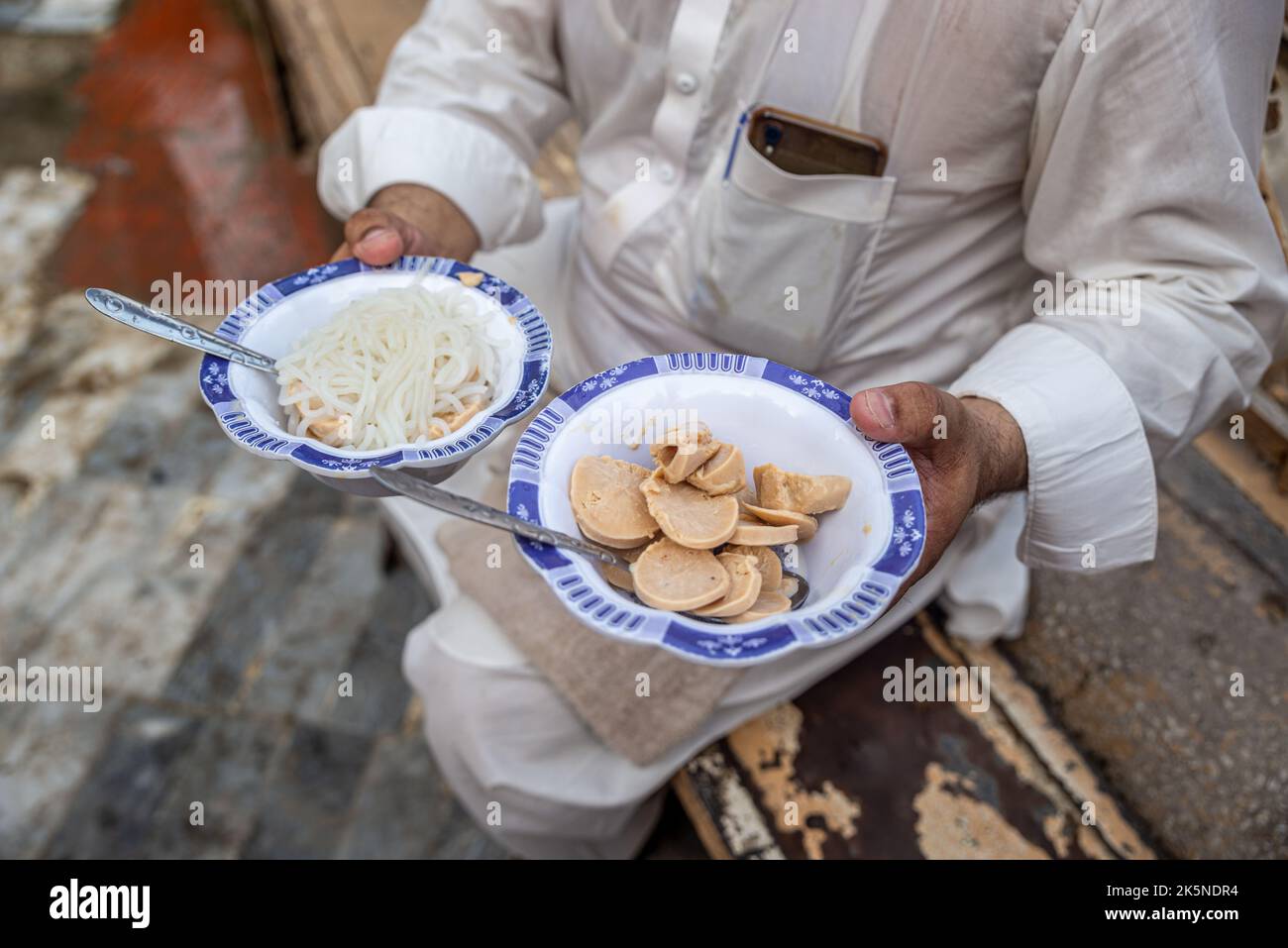 A dish of noodles and milk ice cream, Peshawar, Khyber Pakhtunkhwa ...
