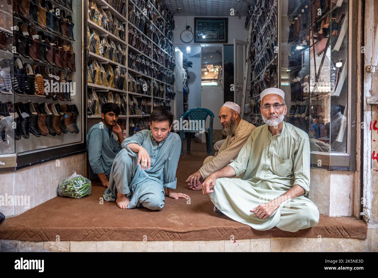 Shop owner and workers shoes and sandals shop, Peshawar, Khyber ...