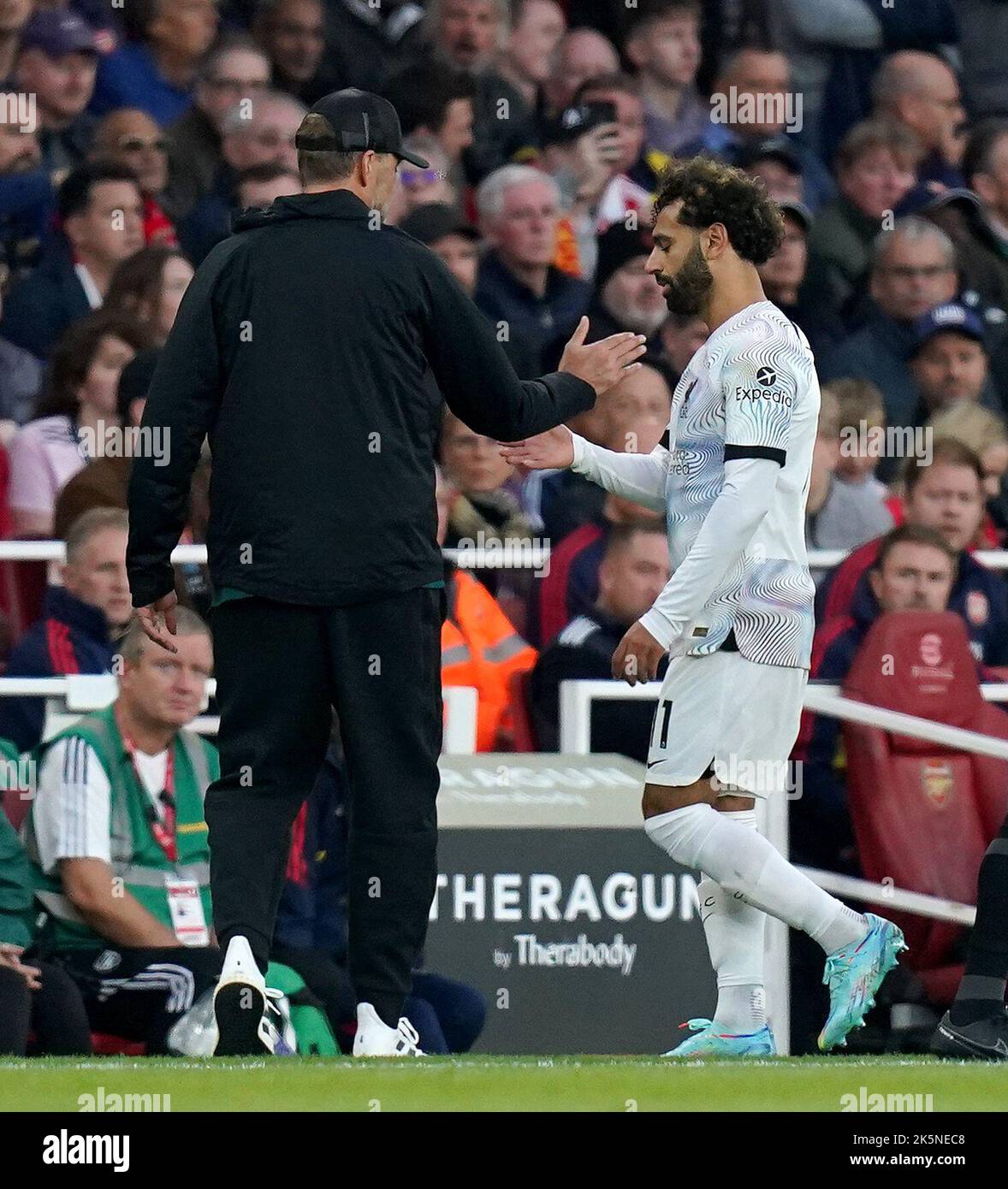 Liverpool's Mohamed Salah shakes hands with manager Jurgen Klopp after ...