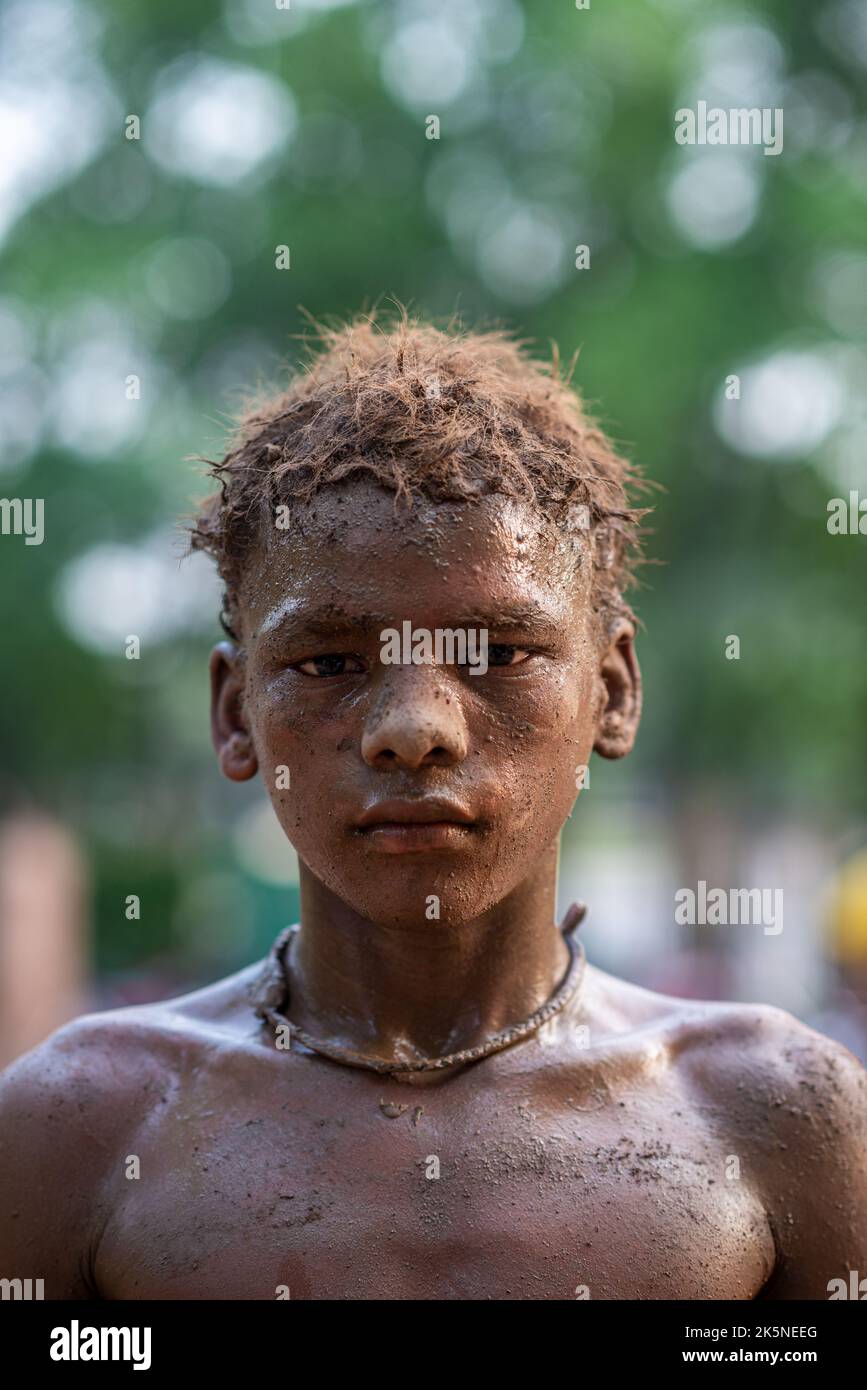 Portrait of a wrestler covered with mud at a kushti akhara (wrestling ...