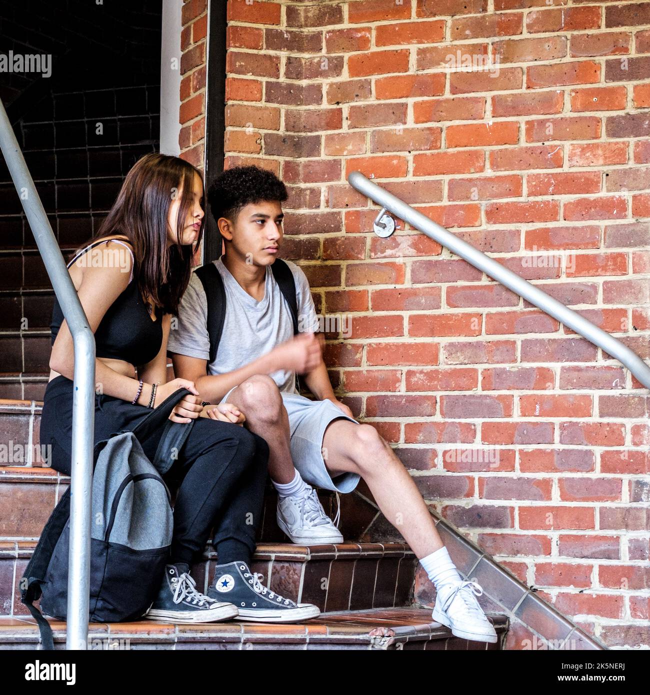 Epsom Surrey UK, October 09 2022, Young Couple Boy And Girl Sitting And ...