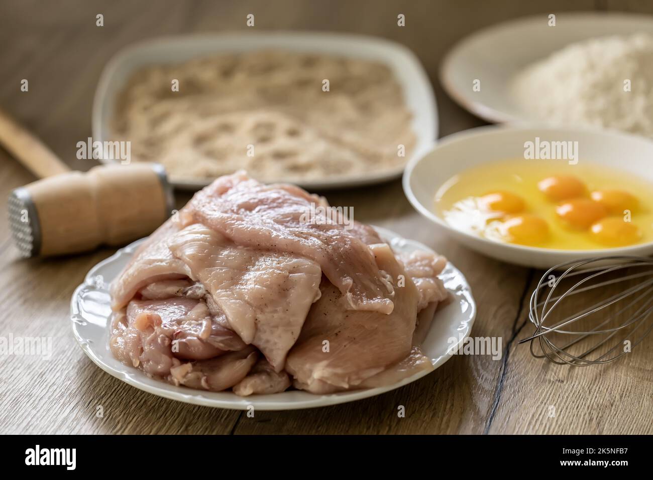Ingredients for wiener schnitzels, chicken meat, eggs, breadcrumbs and ...
