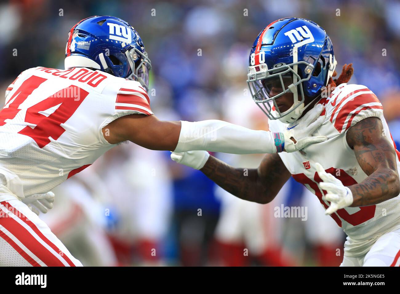 New York Giant's Darnay Holmes (right) and Nick McCloud during the NFL ...