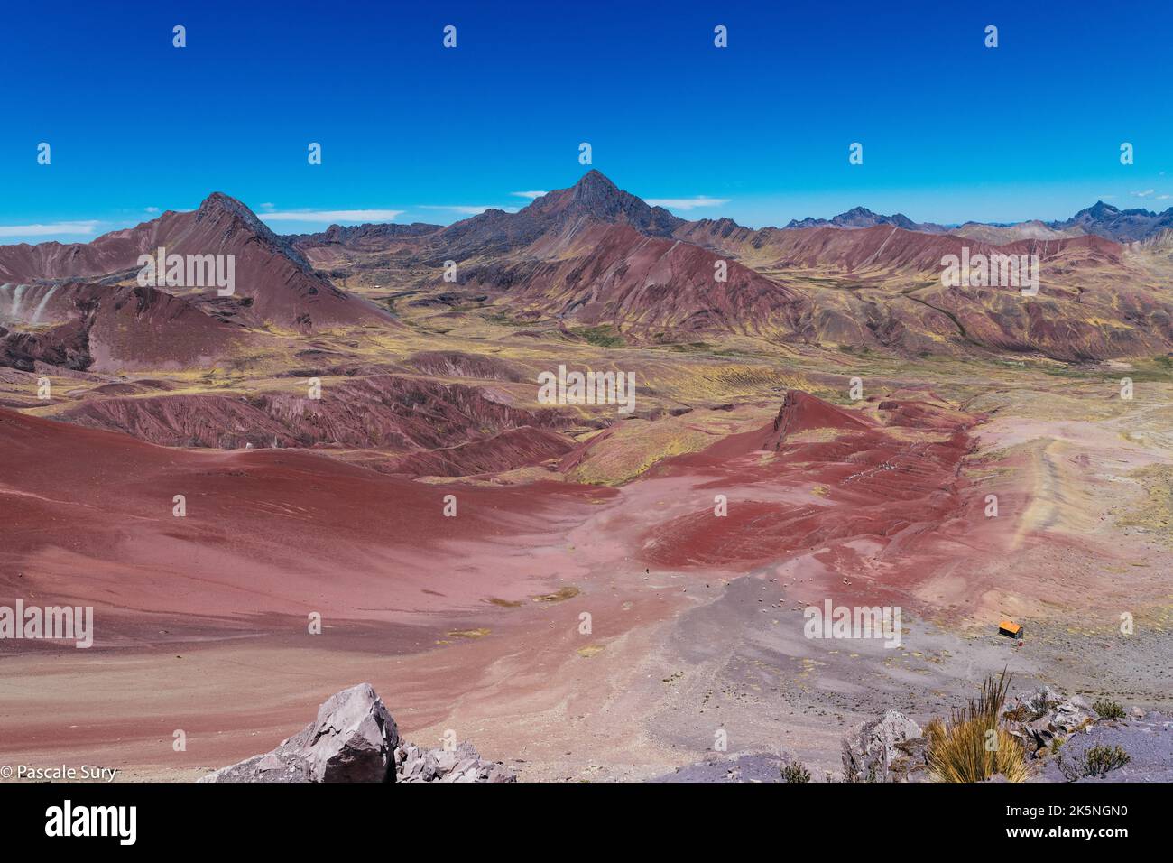 The rainbow mountain and the red valley Stock Photo - Alamy