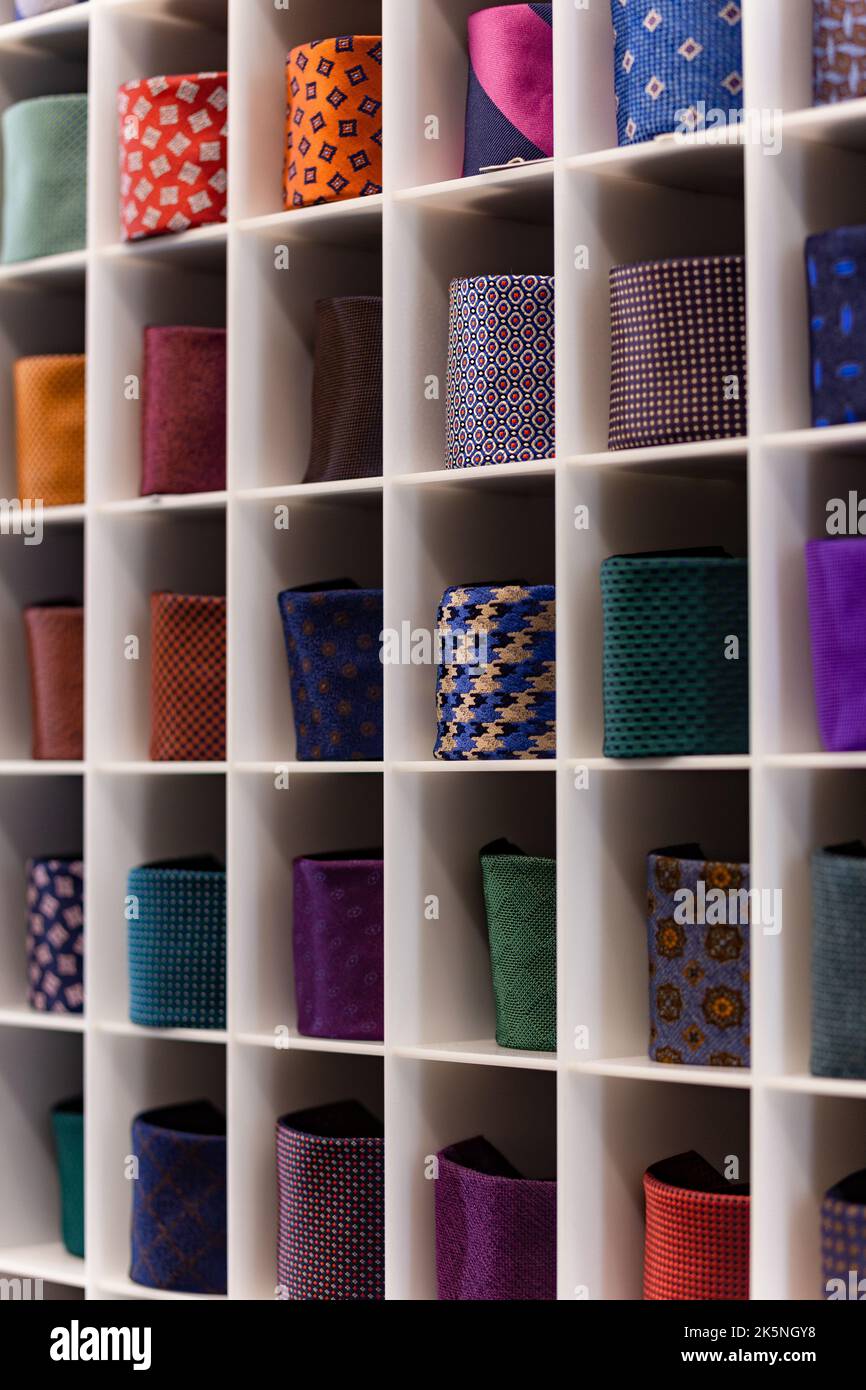 Showcase with multicolored ties. View of different colors ties in ...