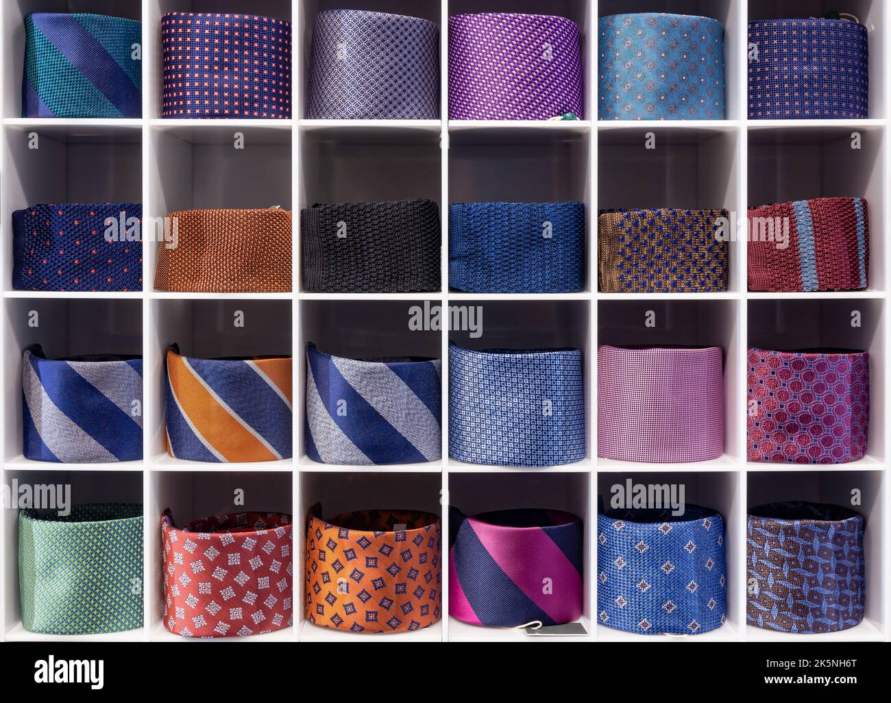 Showcase with multicolored ties. View of different colors ties in ...