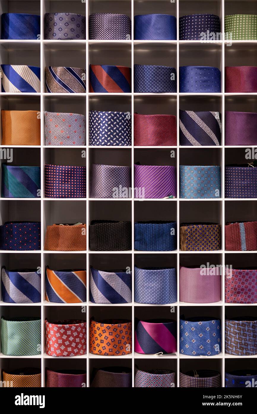 Showcase with multicolored ties. View of different colors ties in ...